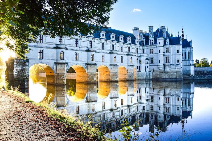 Chateau de Chenonceau reflected in the river Cher