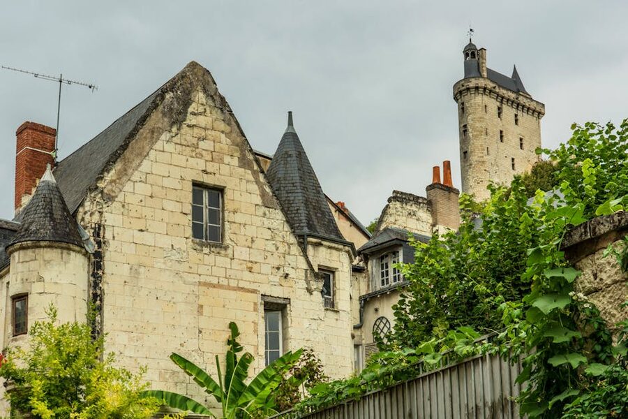 Old town of Chinon with stone houses and the chateau on the hill