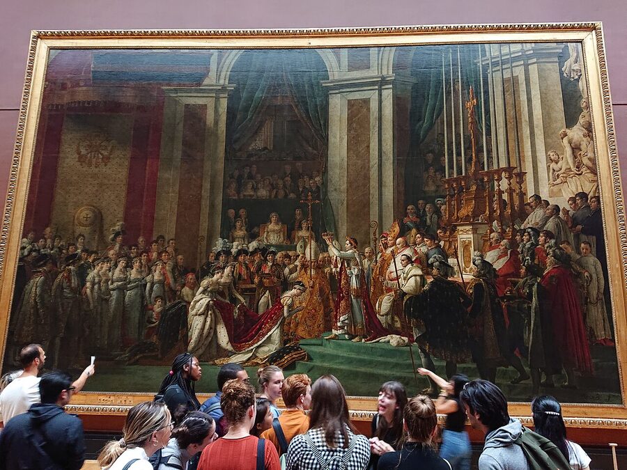 Visitors looking at The Coronation of Napoleon by Jacques-Louis David Louvre
