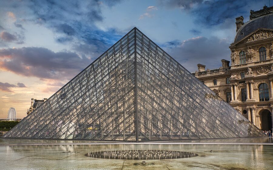 Louvre Pyramid in the early evening Paris