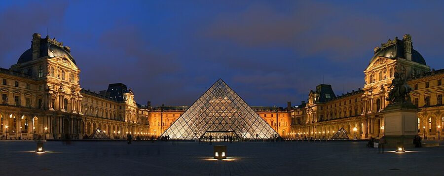 Cour Napoleon at night with the Louvre pyramid lit up