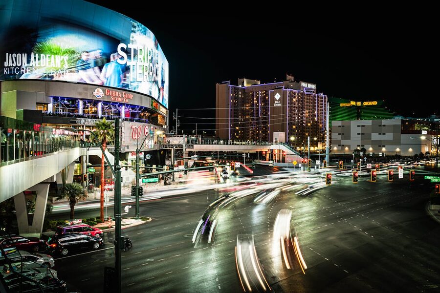 Las Vegas Strip at night with lights and busy intersection