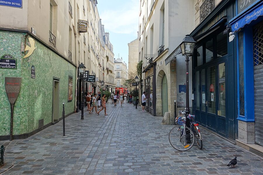 Rue des Rosiers Jewish Quarter in Le Marais Paris with shops and pedestrians