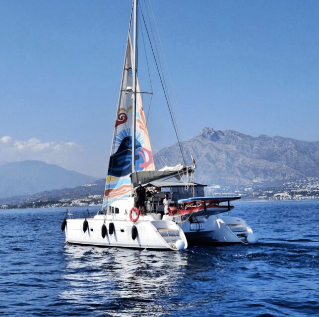Marbella: Group Dolphin Watching Catamaran Tour with Snacks - The Experience: A Closer Look at the Highlights