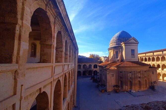 Marseille Guided Tour for 2.5 Hours with a Bilingual Local Guide - Walk along La Canebière