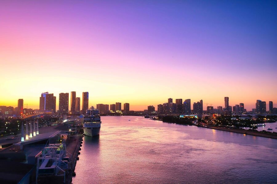 Panoramic view of Miami downtown at sunset with a cruise ship on the water