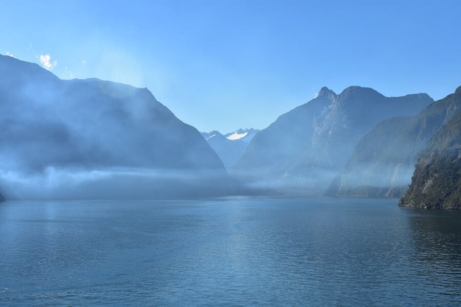 Milford Sound fjord with mist hugging the cliffs