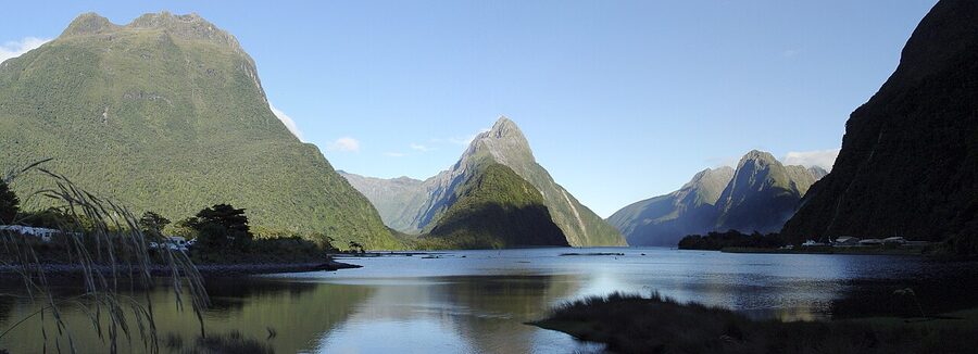 Mitre Peak rising from Milford Sound under a clear sky