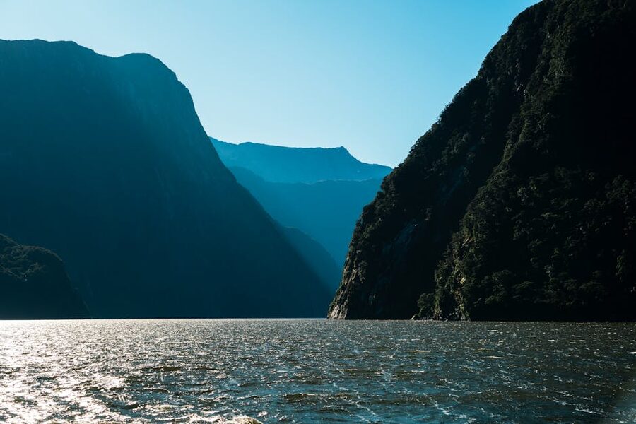 Calm reflective water in Milford Sound