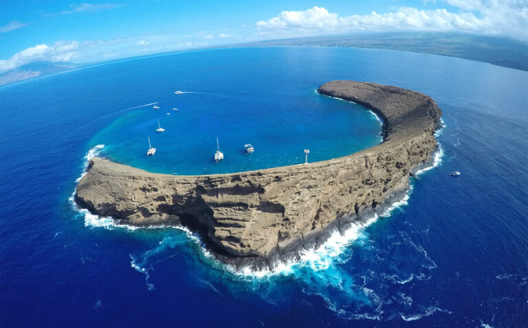 Aerial view of the crescent-shaped Molokini Crater off the coast of Maui Hawaii