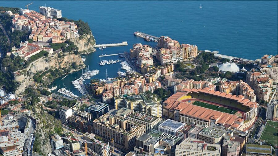 Aerial view of Monaco coastal cityscape with harbours and Mediterranean Sea