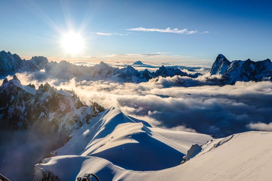 Sunset over snow capped peaks Chamonix Mont Blanc