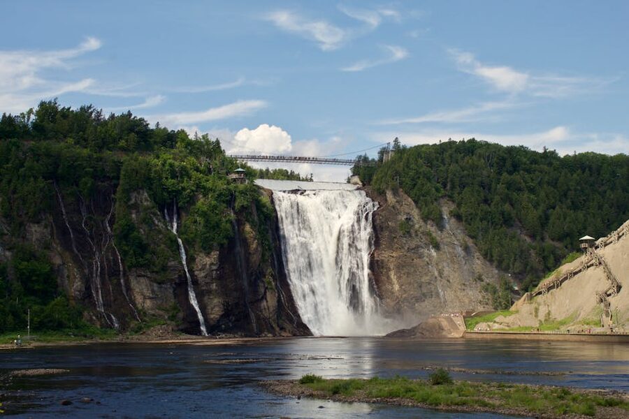 Montmorency Falls suspension bridge in sunny weather