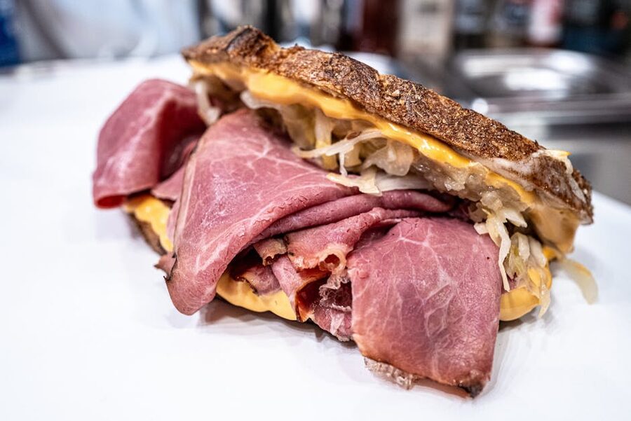 Close-up of smoked meat on rye bread