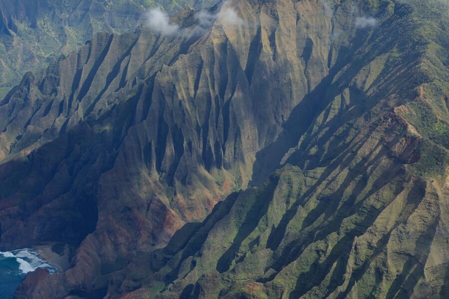 Aerial shot of dramatic Na Pali coast cliffs in Kauai