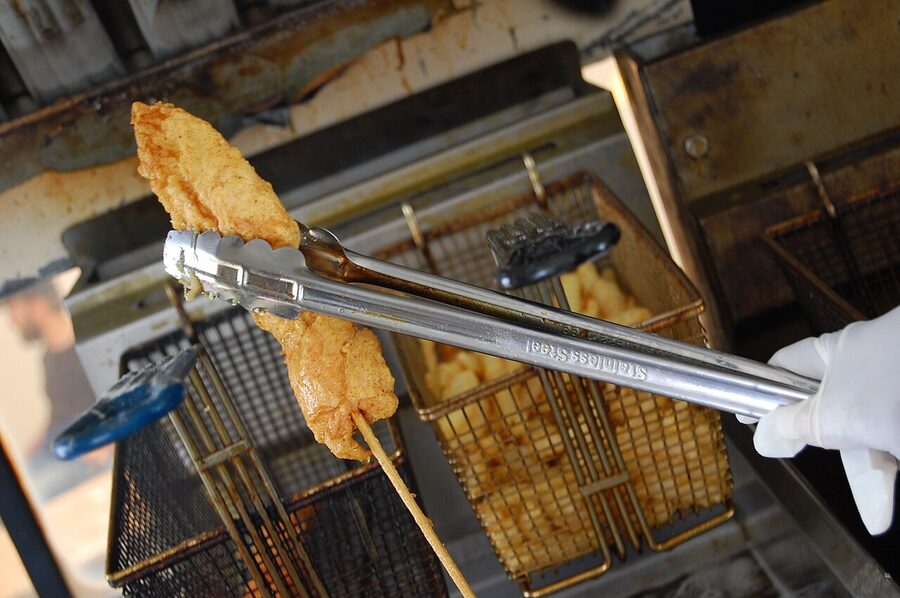 Hot chicken coming out of the fryer at Boltons Nashville