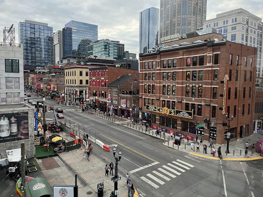 Broadway Nashville during the day showing historic buildings and bars