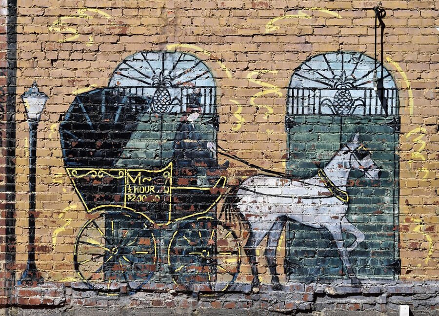 Large mural painted on brick wall in downtown Nashville