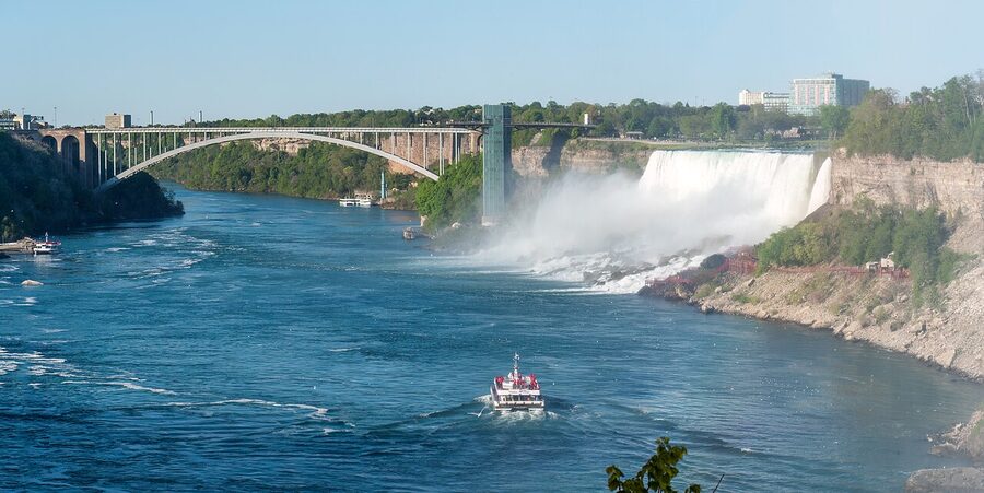 Rainbow Bridge spanning Niagara River with American Falls visible