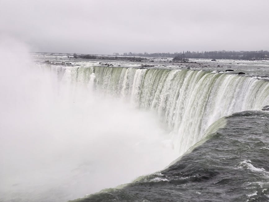 Niagara Falls in winter with snow and mist