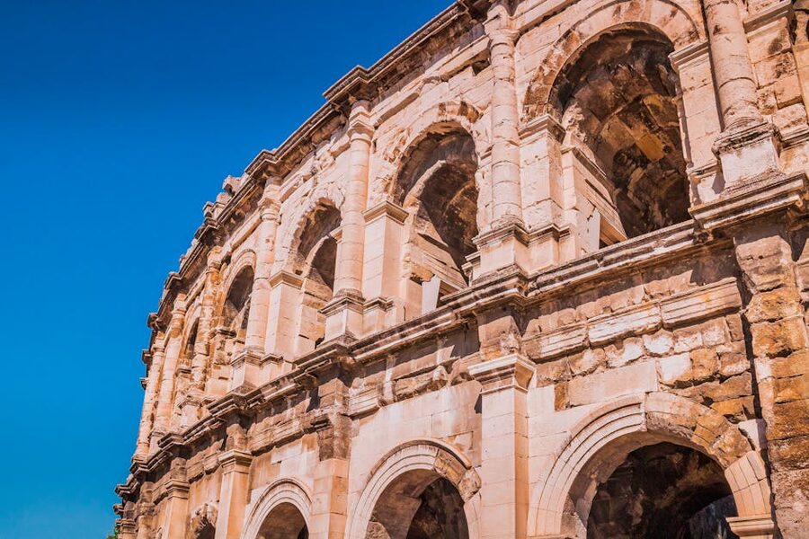 Roman amphitheatre Arena of Nimes France blue sky