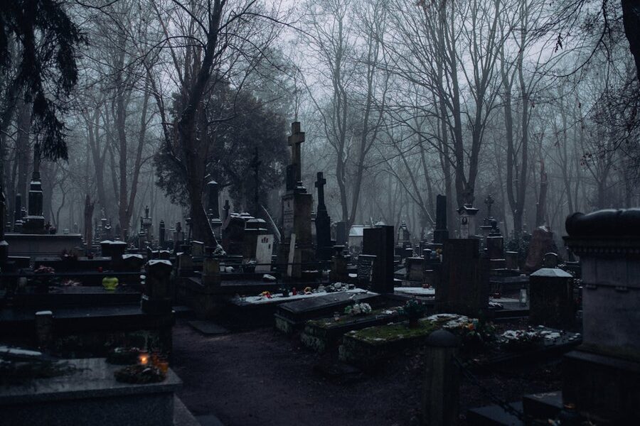 Eerie cemetery with fog and gravestones gothic atmosphere