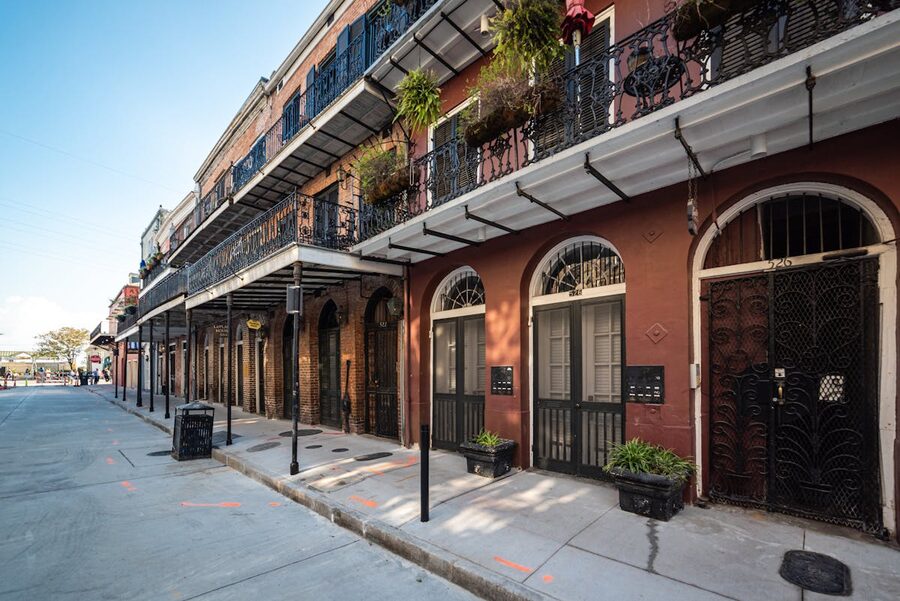 Historic ironwork balconies on New Orleans French Quarter street
