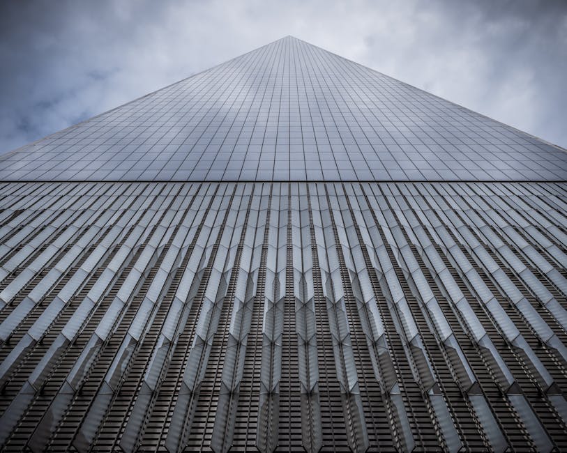 One World Trade Center against dramatic cloudy sky