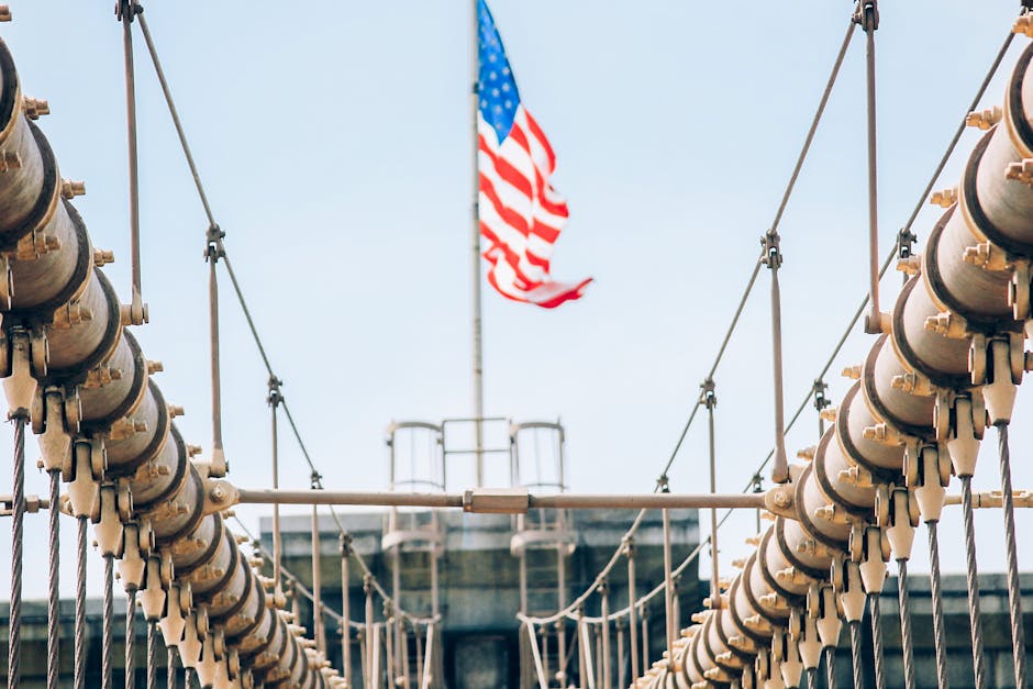 Brooklyn Bridge cables with American flag