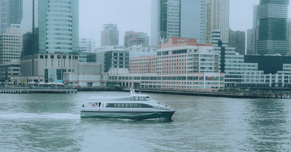 Ferry on Hudson River with NYC skyline