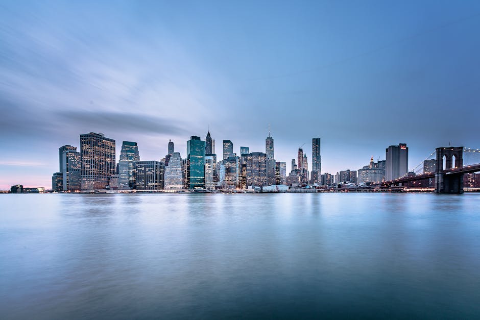 NYC skyline and Brooklyn Bridge at dusk