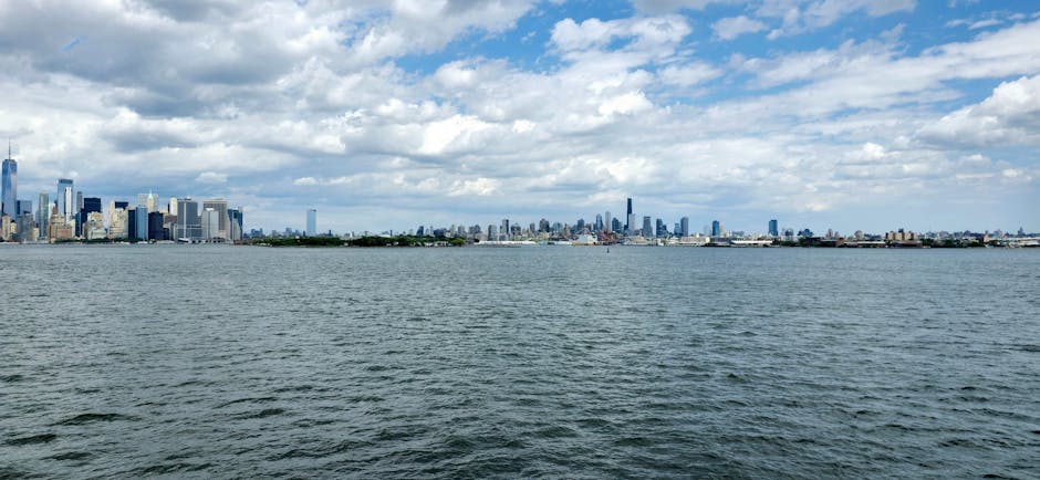 Panoramic NYC skyline from harbor