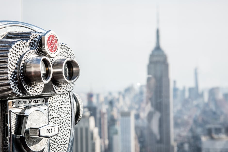 Observation deck binoculars with NYC skyline