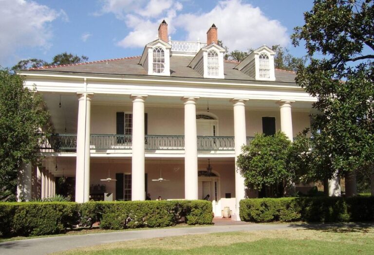 Oak Alley Plantation house viewed through the famous canopy of 28 live oak trees
