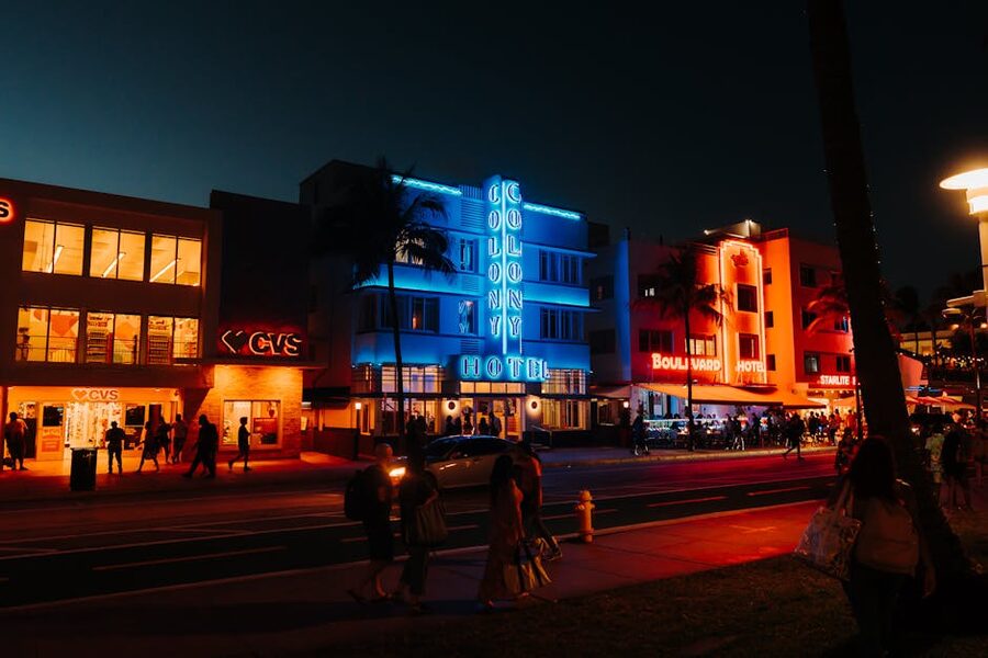Colorful neon-lit hotels on Ocean Drive Miami Beach at night