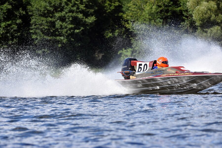An offshore powerboat racing across open sea