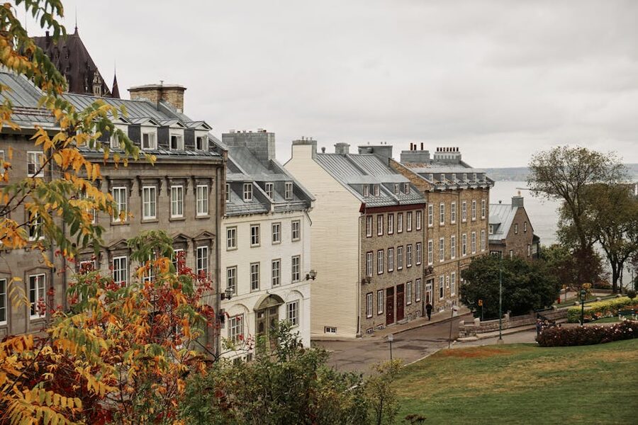 Fall foliage on a historic street in Old Quebec City with colorful trees