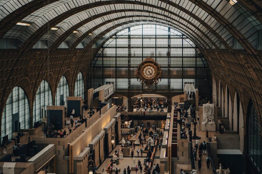 Visitors gathered around the Musee d'Orsay gallery near the clock