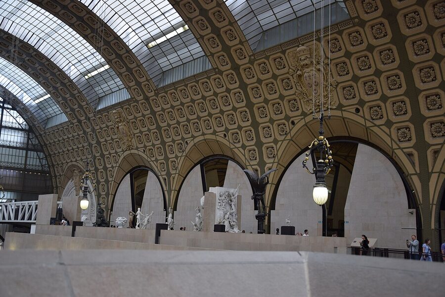 Musee d'Orsay grand nave with vault ceiling and sculptures