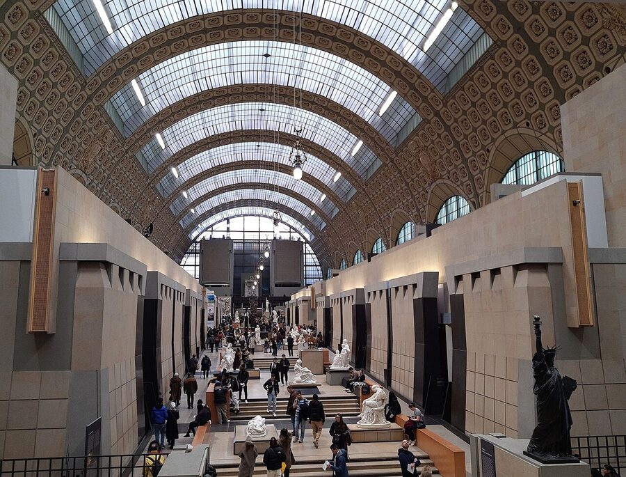 Musee d'Orsay nave from upper level with sculpture in foreground