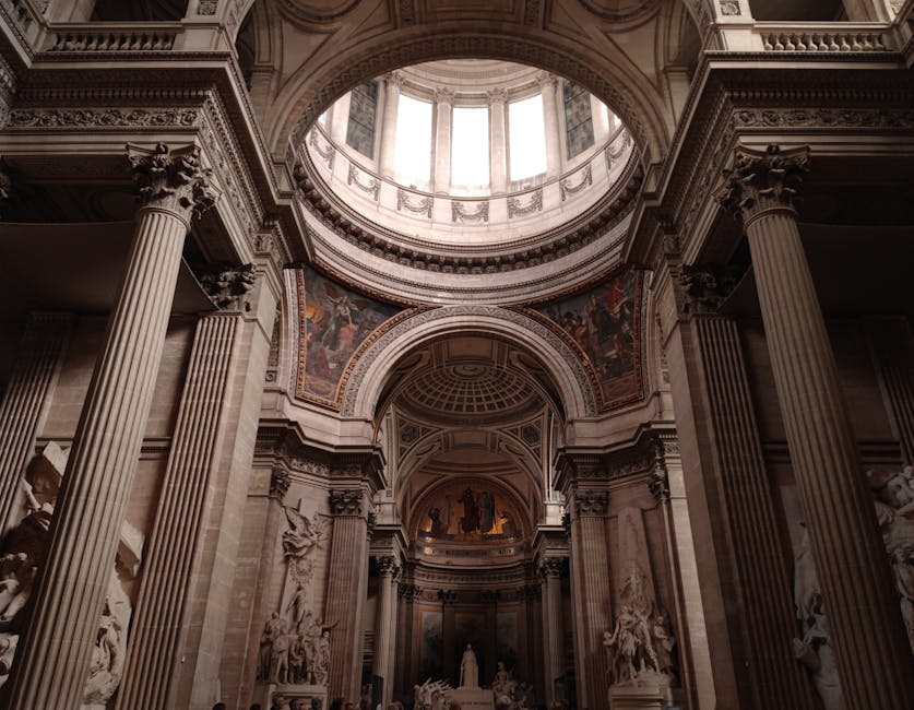 Painted frescoes and sculptures in the nave of the Panthéon Paris