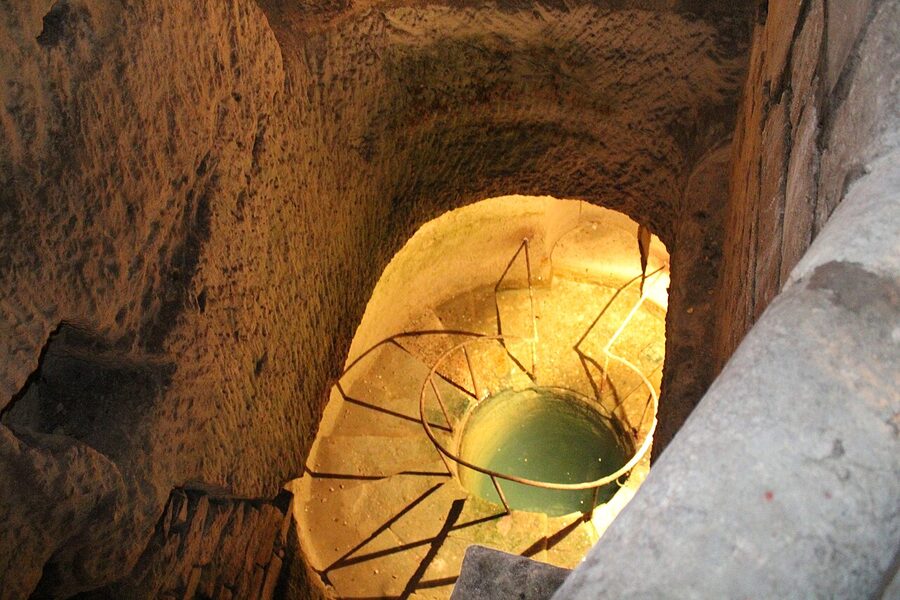 Decorative bone arrangement along a corridor in the Paris Catacombs ossuary