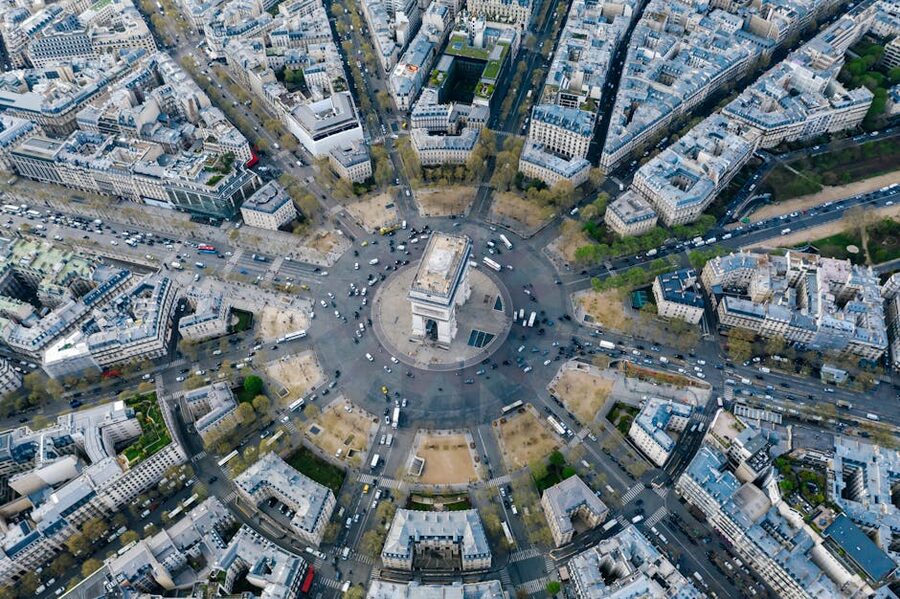 Aerial view of Arc de Triomphe at the centre of the Etoile roundabout Paris