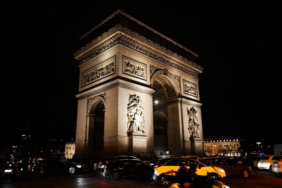Arc de Triomphe illuminated at night Paris bus night tour