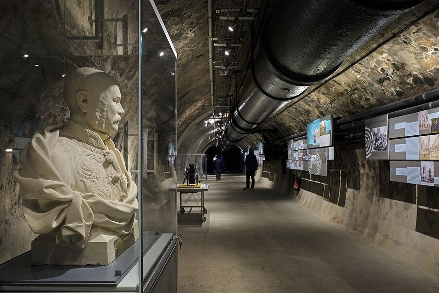 Stone-vaulted gallery inside the Paris Sewer Museum after the 2021 renovation