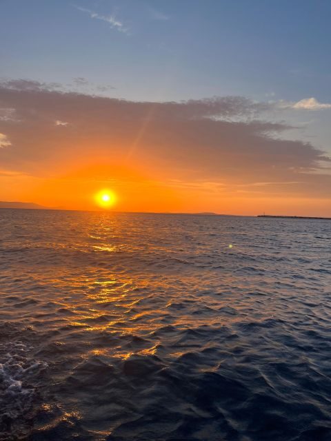 Paros: Sunset Boat Tour to Antiparos with Wine - Detailed Breakdown of the Itinerary