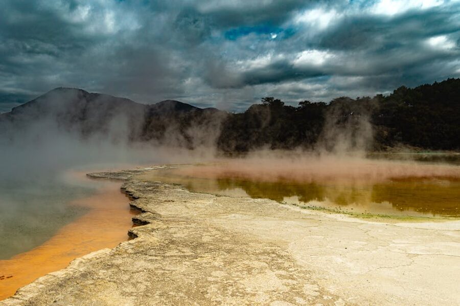Rotorua geothermal landscape with mineral colours and steam columns