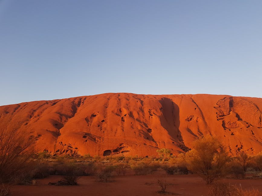 Uluru at sunrise with clear skies