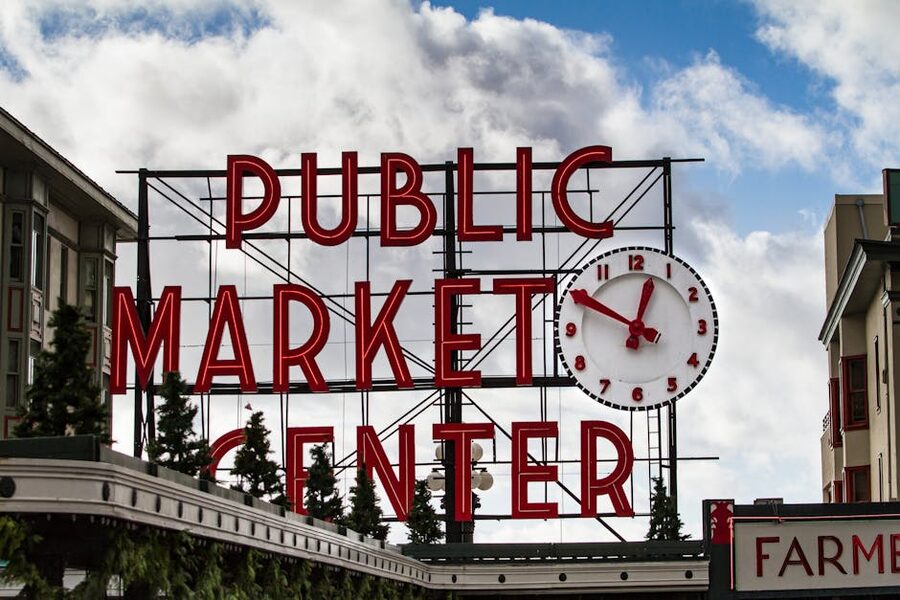Pike Place Market sign and iconic clock tower Seattle
