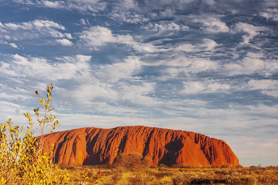 Uluru with bushland in the foreground